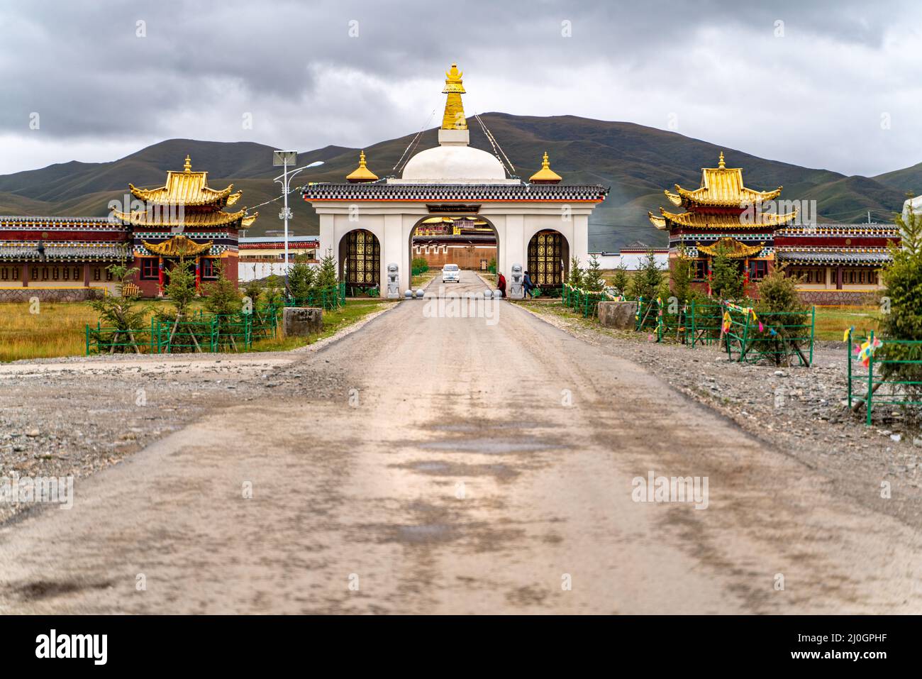 The entrance golden gate to the tibetan buddhist monastery Stock Photo ...