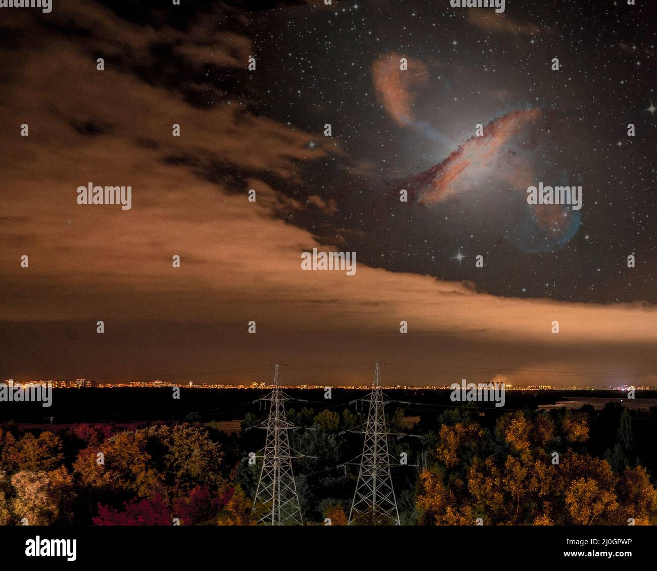 Beautiful night view of a city under the mystical sky Stock Photo - Alamy