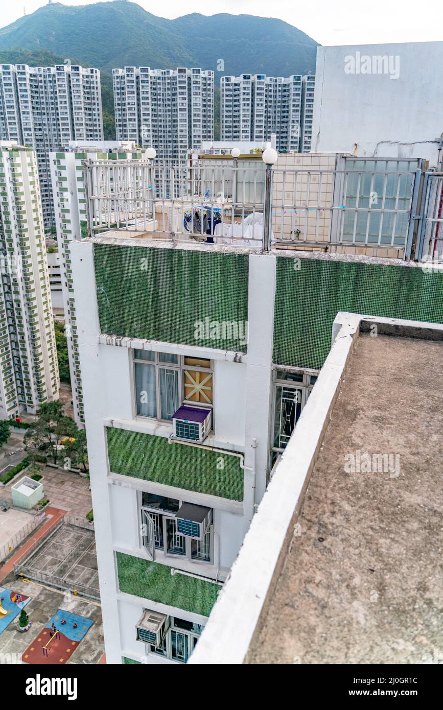 The view of residential neighborhood and skyscrapers from rooftop in ...
