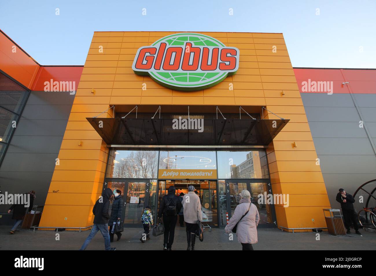 Moscow, Russia. 18th Mar, 2022. Logo of a Globus store on a building in ...