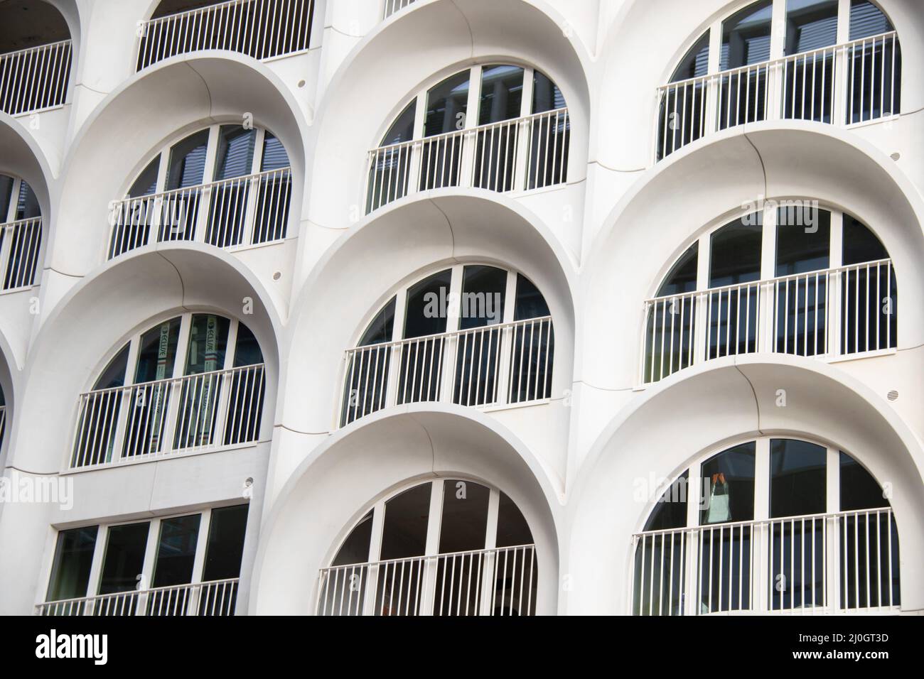 Exterior of white residential building Stock Photo - Alamy