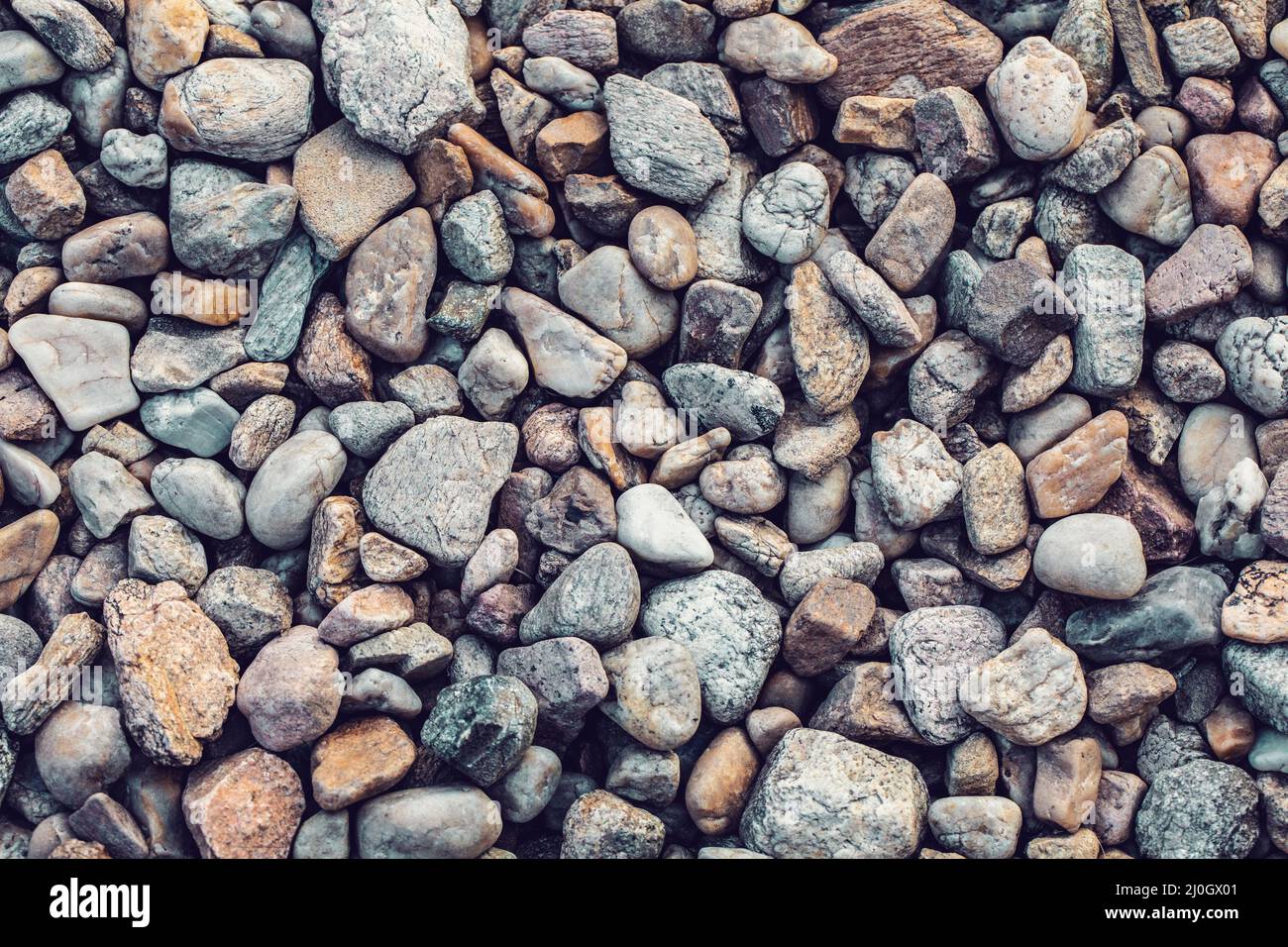 Pebbles texture background Stock Photo - Alamy
