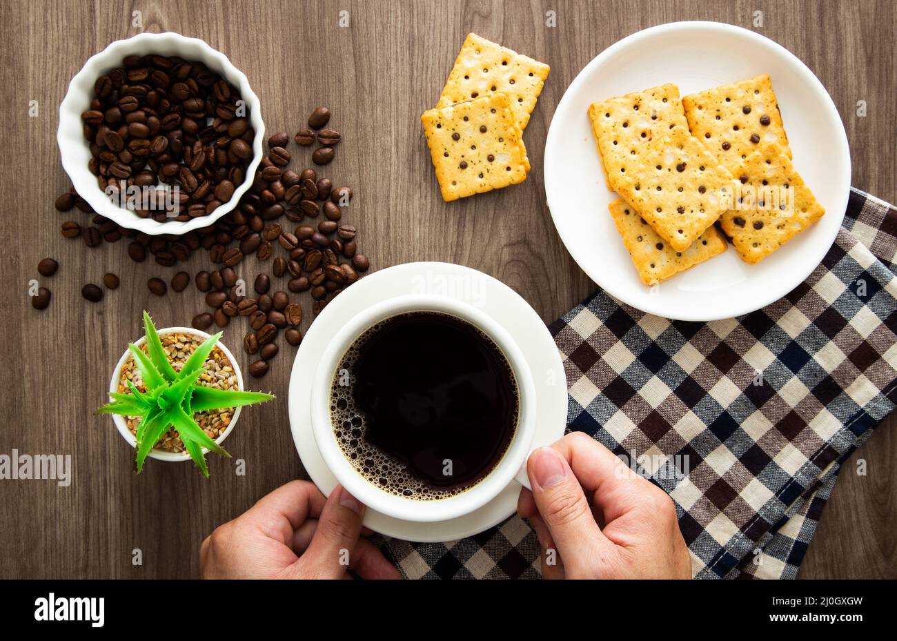 Flat lay of table with biscuit and coffee Stock Photo - Alamy