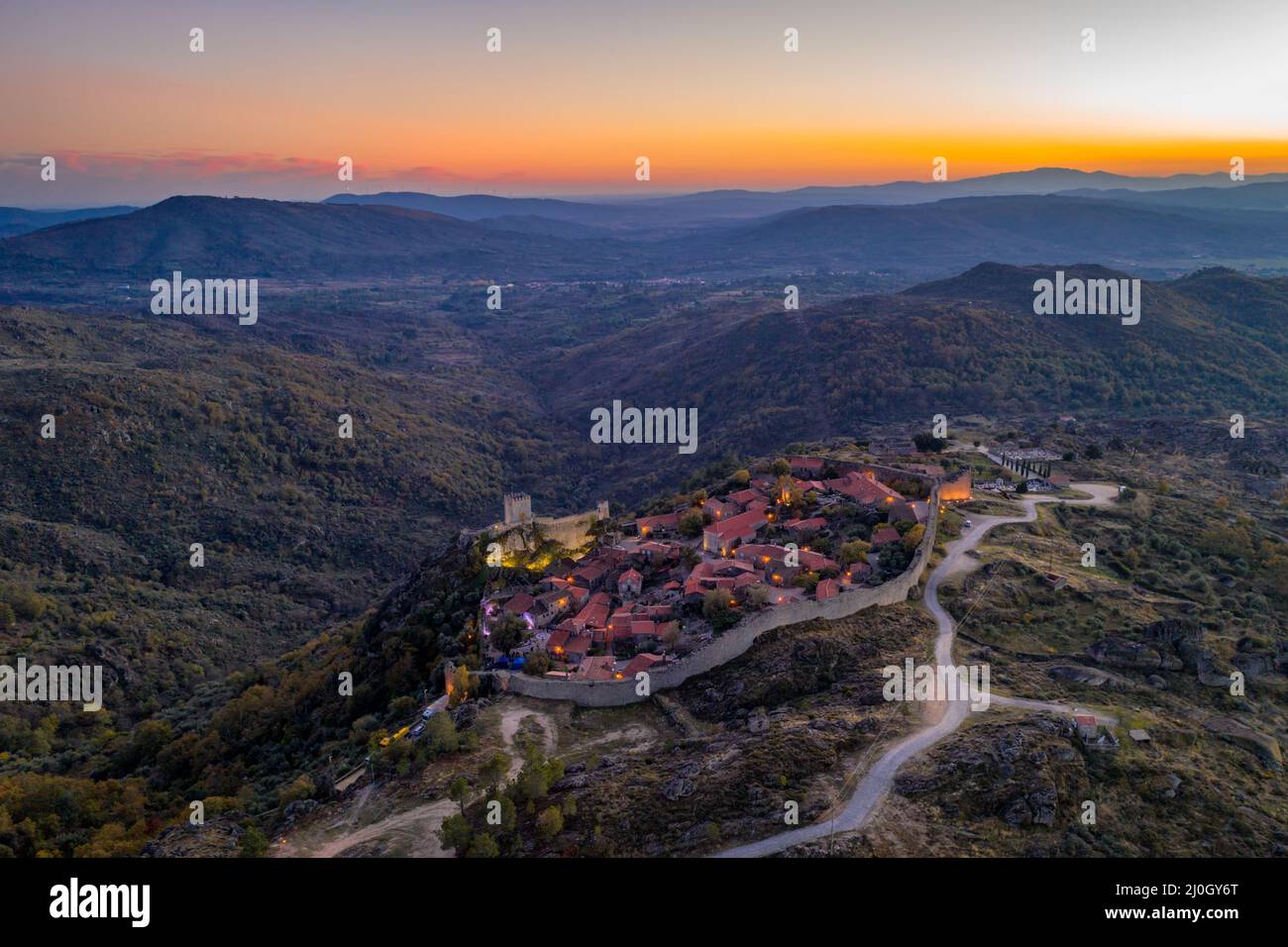 Drone aerial panorama of Sortelha historic village at sunset with ...