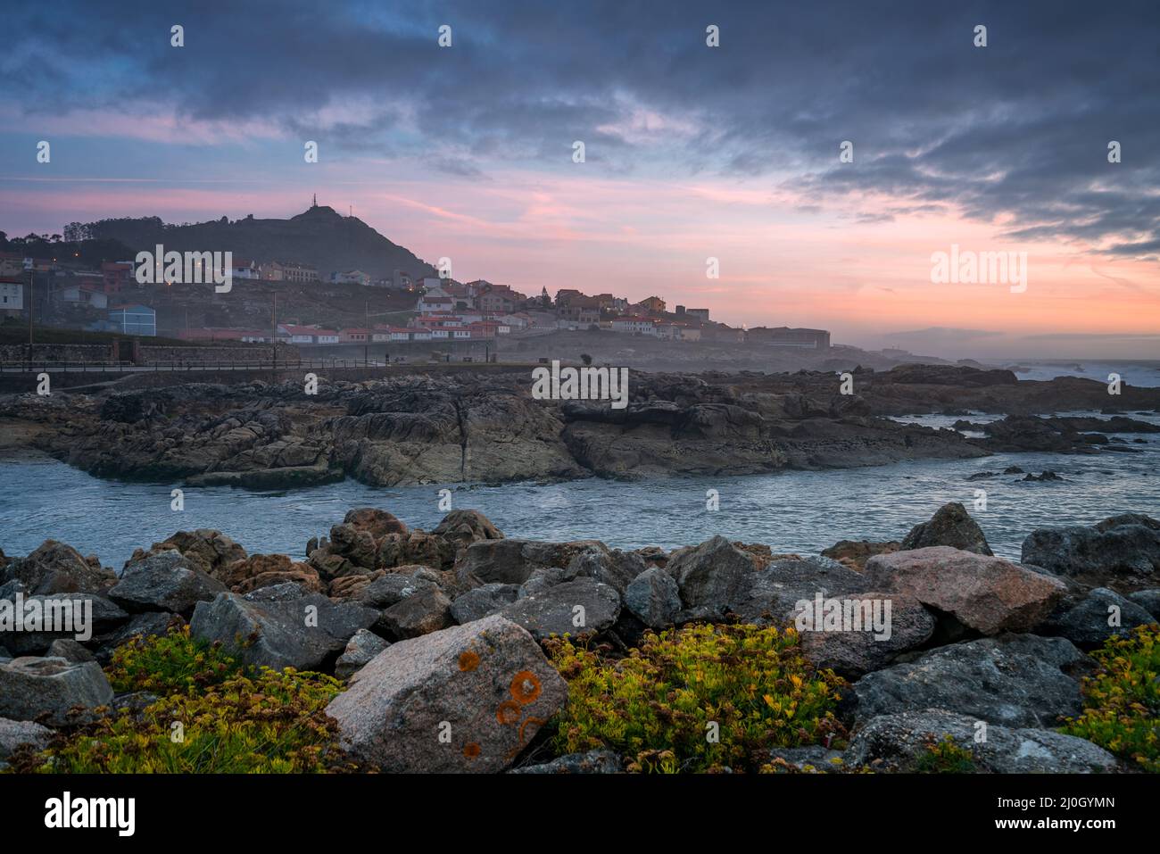A Guarda beautiful sea landscape rock beach with city on the foreground ...