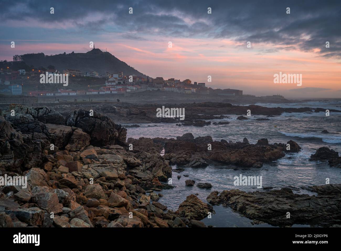 A Guarda beautiful sea landscape rock beach with city on the foreground ...