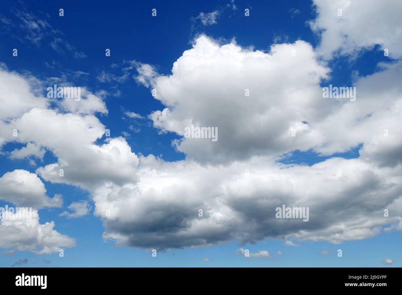 Cumulus clouds in the blue sky Stock Photo - Alamy