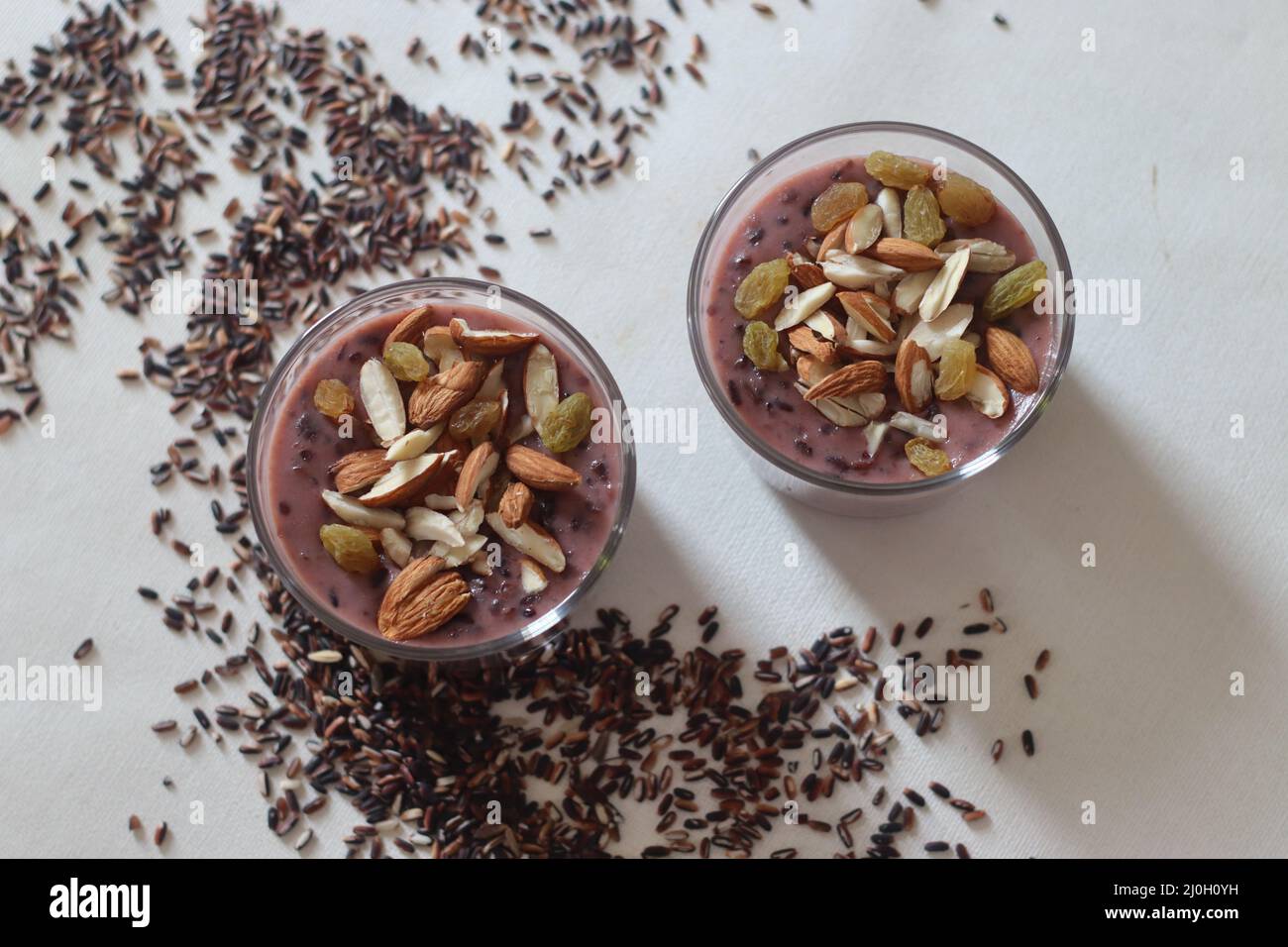 Black rice pudding. Made with black rice simmered in milk, sweetened ...