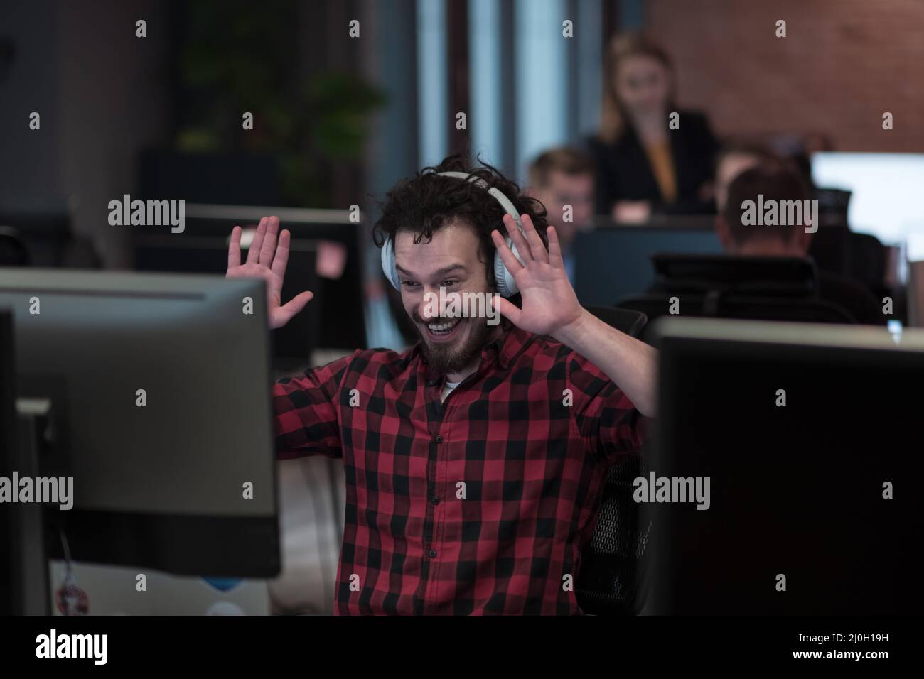 Funny businessman wearing headset having virtual team meeting group ...