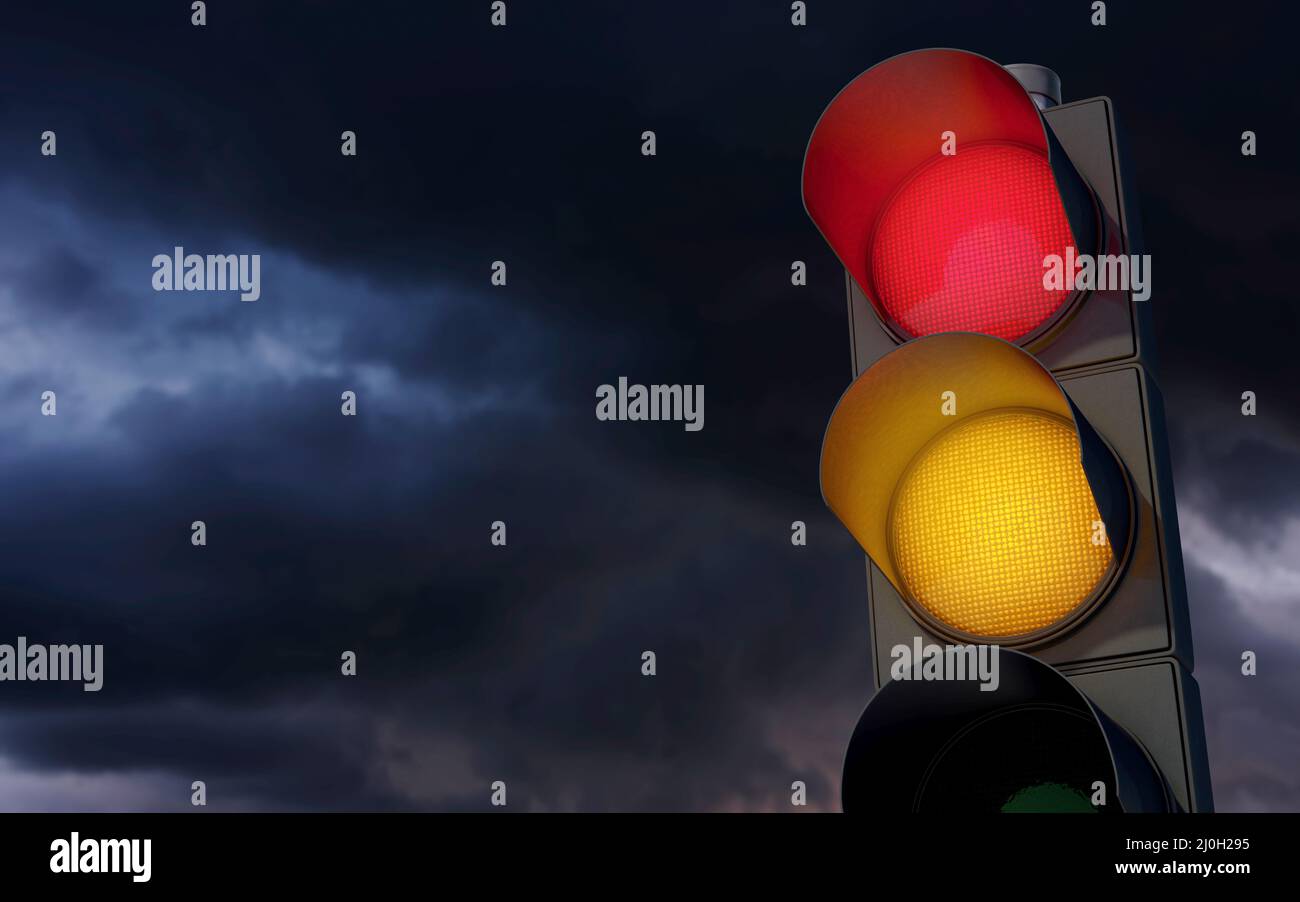 The traffic light switches from yellow to red Stock Photo - Alamy