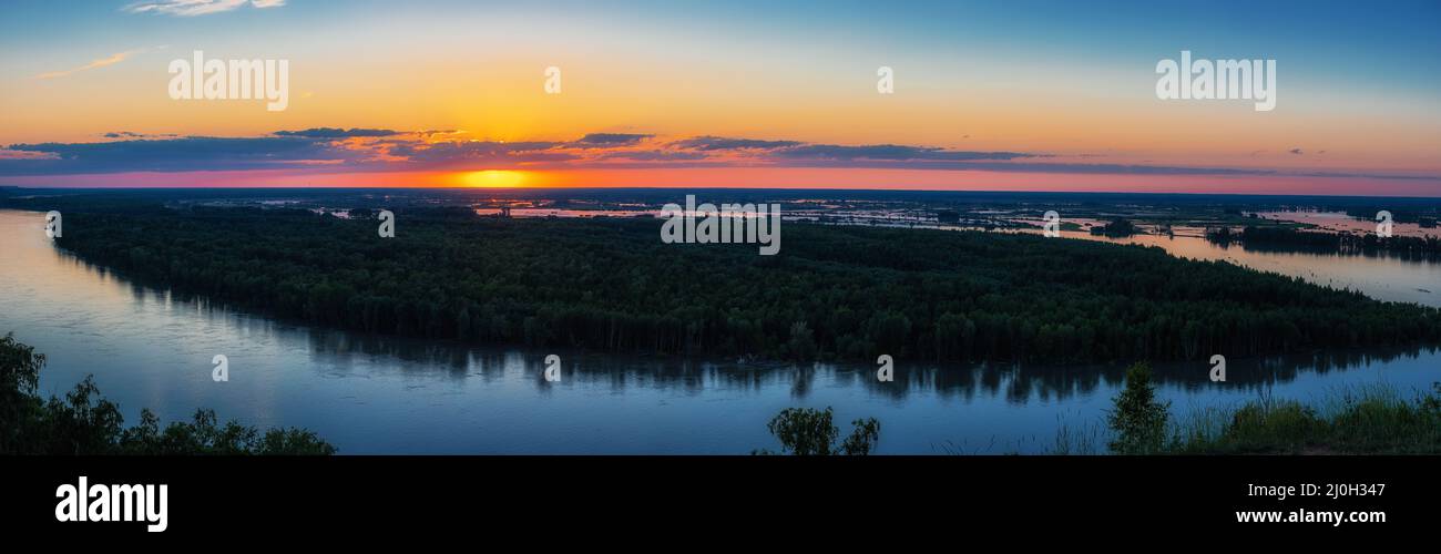 Big panoramic picture view of river landscape in sunny summer evening ...