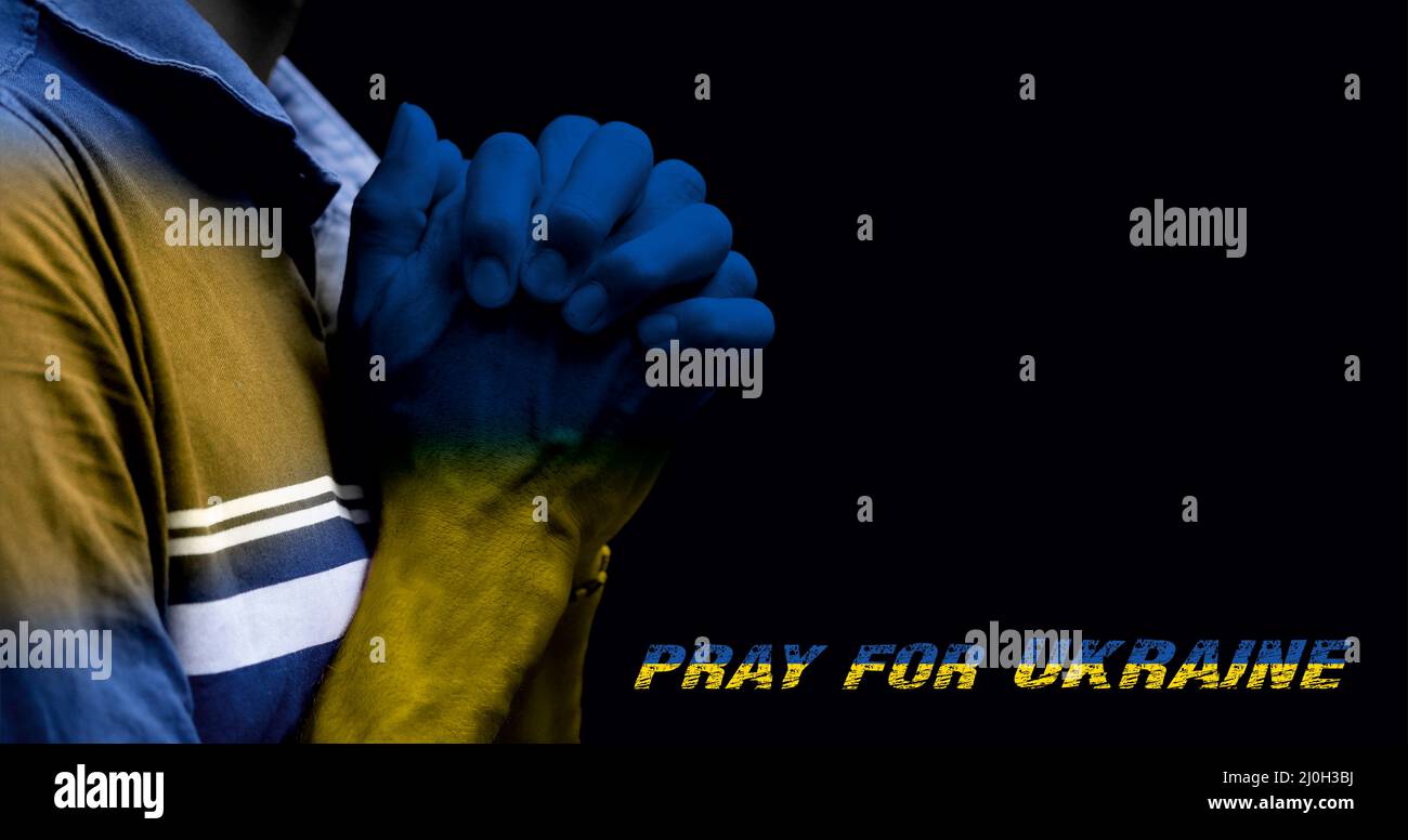 Pray hand for Ukraine, flag Ukraine. Russia vs Ukraine stop war. Pray ...