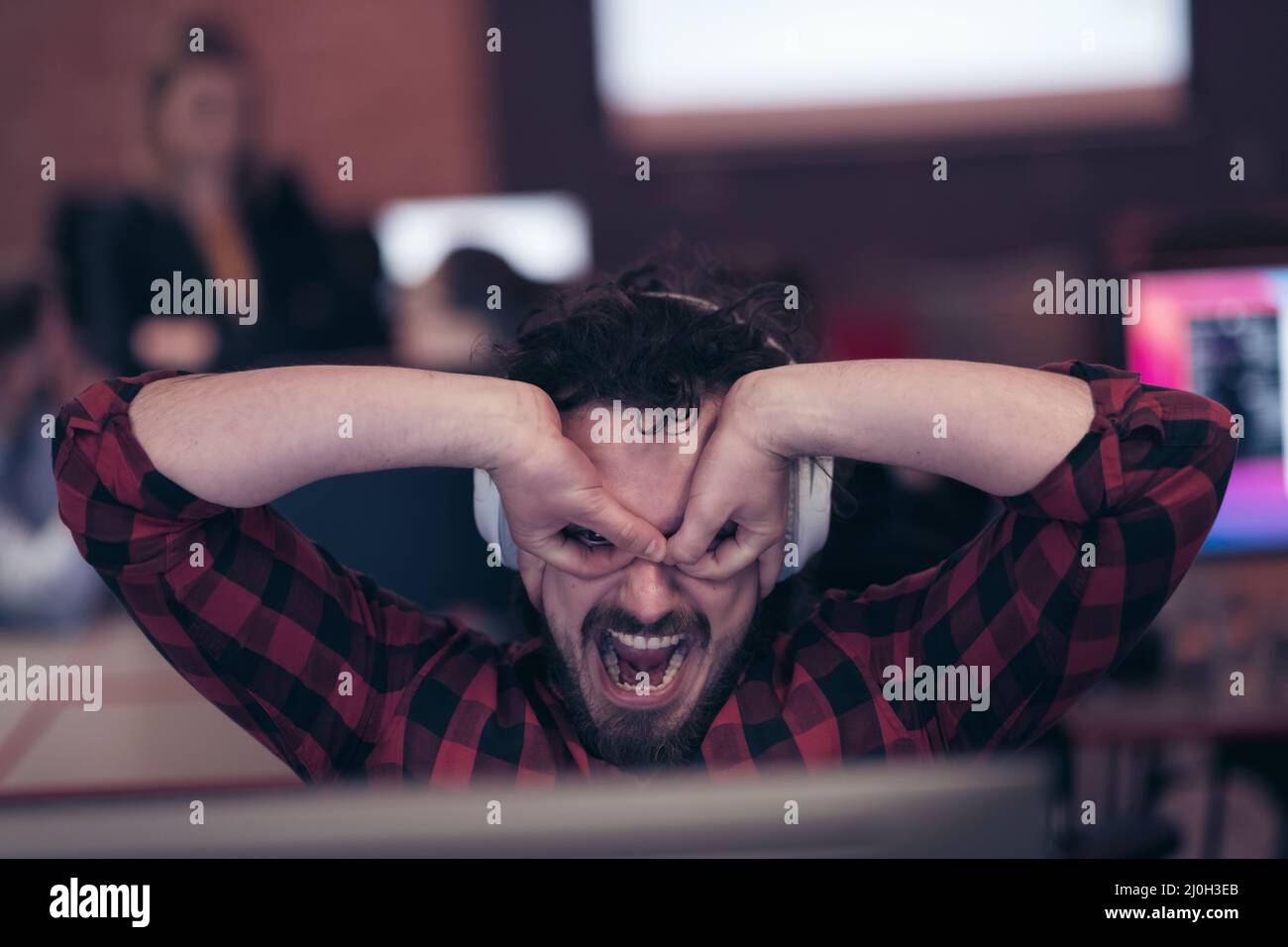 Funny businessman wearing headset having virtual team meeting group ...