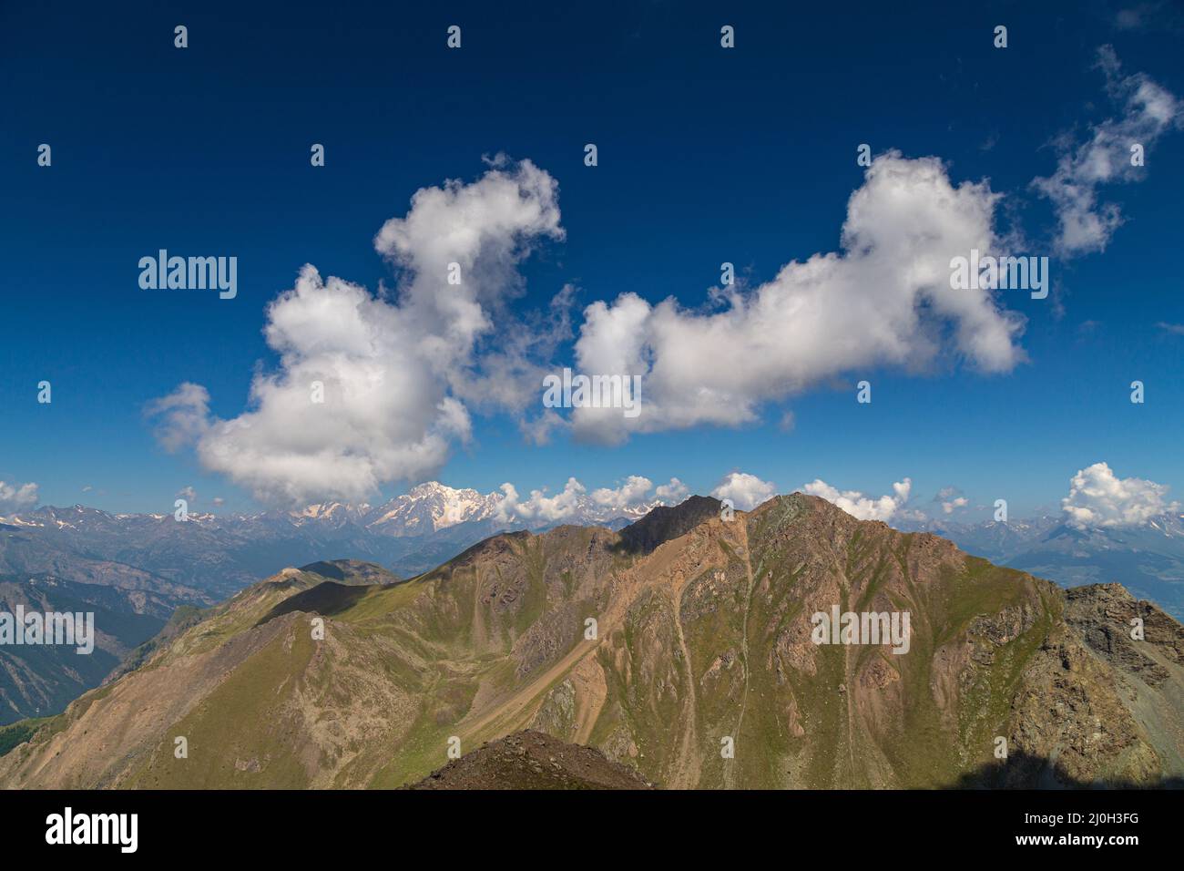 The beautiful valley in front of the Gran Paradiso in a summer day ...