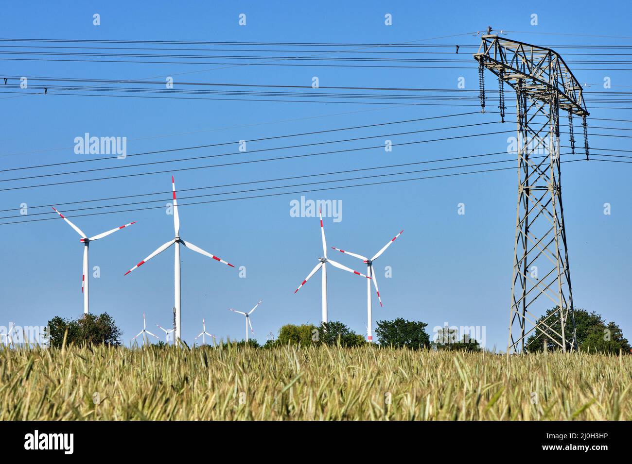 Power lines and wind turbines seen in Germany Stock Photo - Alamy