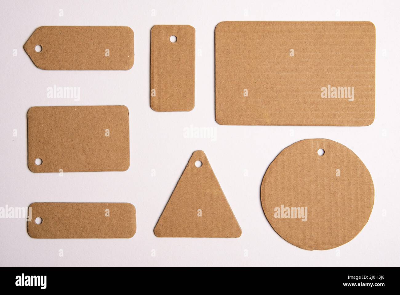 Realistic cardboard price tags of different shapes isolated on white ...