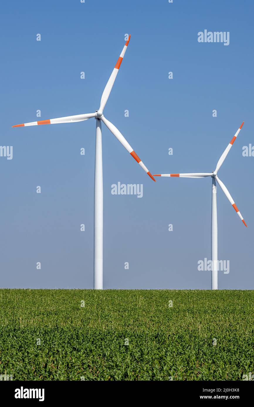 Wind turbines in a grainfield seen in Germany Stock Photo - Alamy