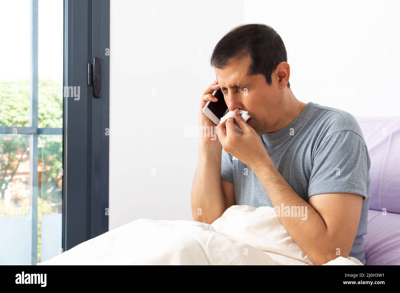Shot of a patient talking to a doctor using of a phone Stock Photo - Alamy