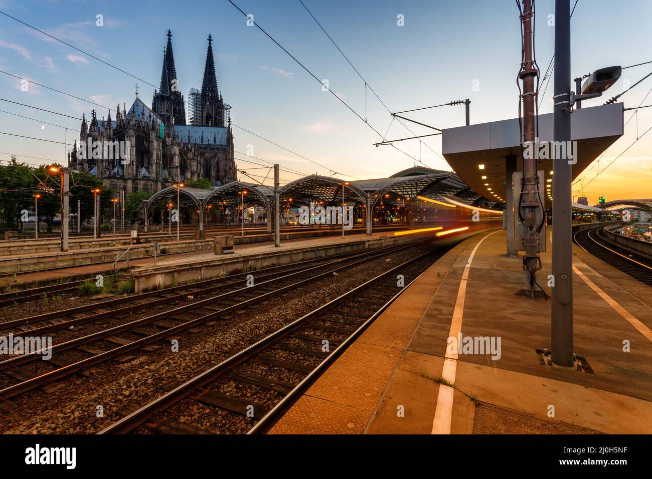 Train in motion, Cologne. Cologne Cathedral Stock Photo - Alamy