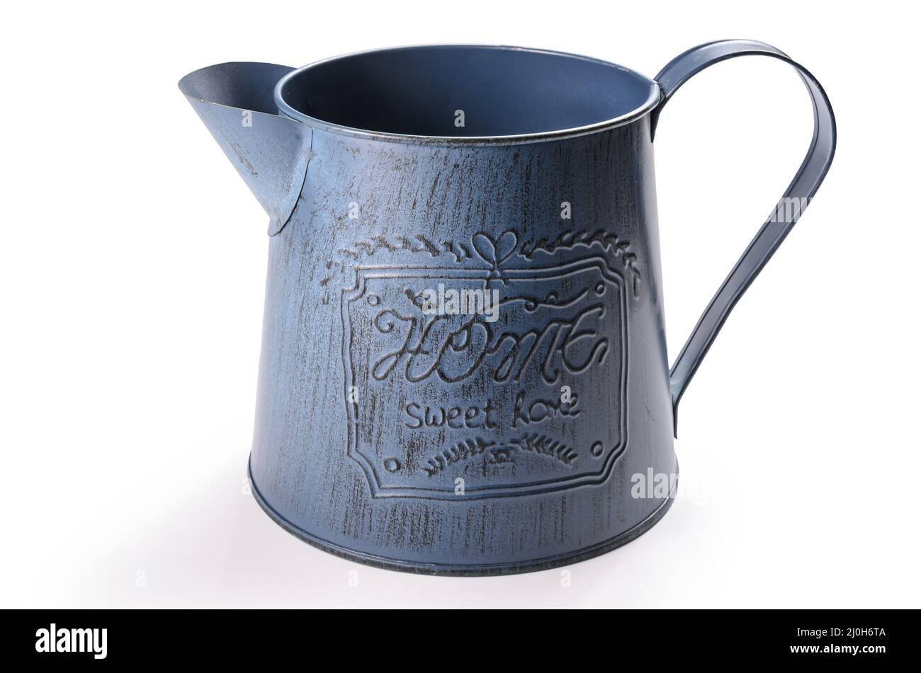 Iron jug for watering flowers on white background Stock Photo - Alamy
