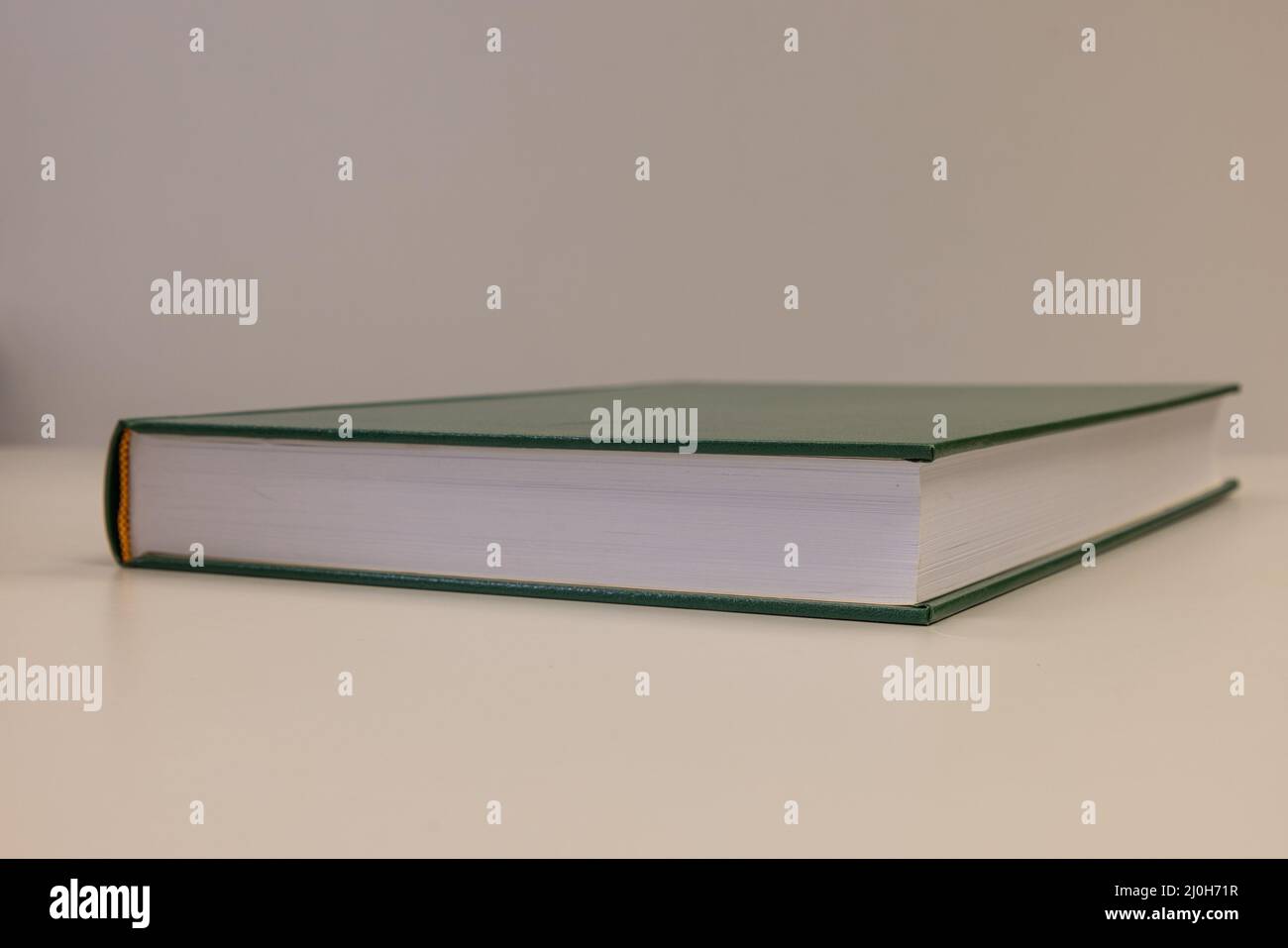 a PhD thesis of green cover Stock Photo - Alamy