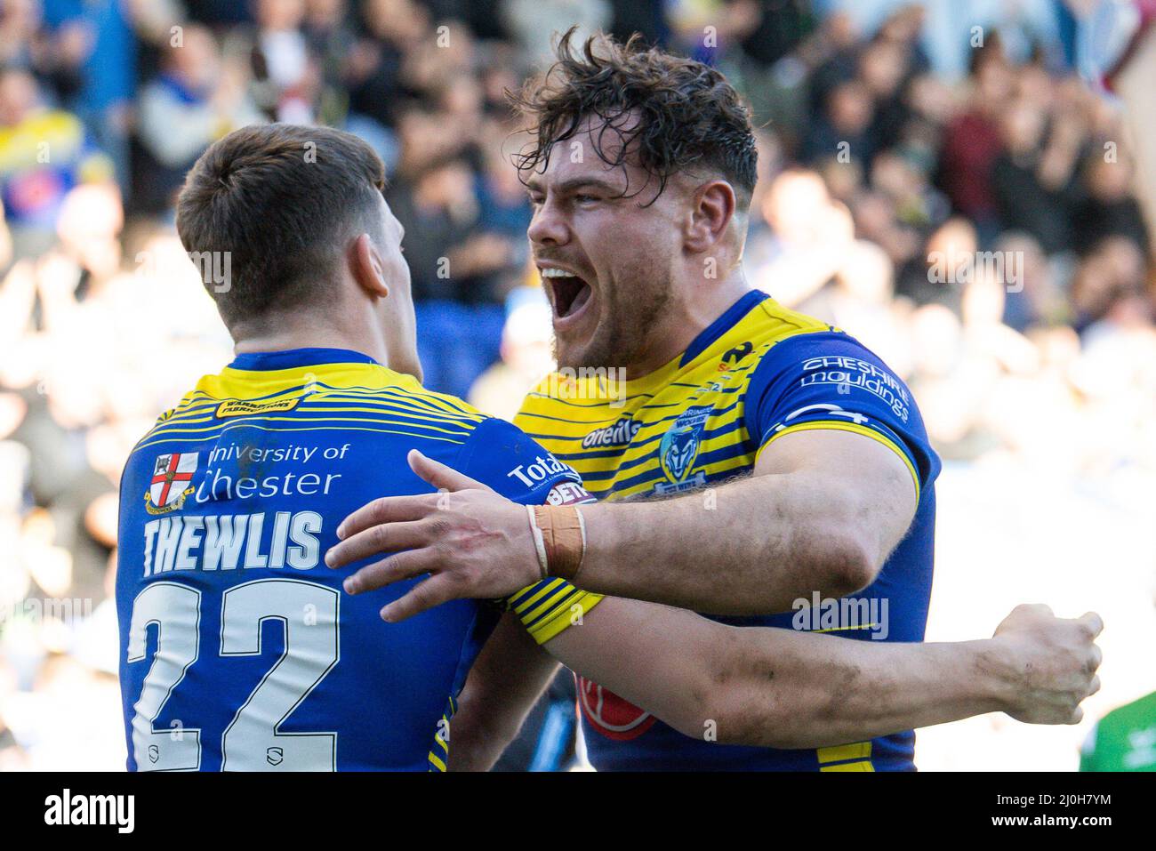 Josh Thewlis #22 of Warrington Wolves celebrates his try Stock Photo ...