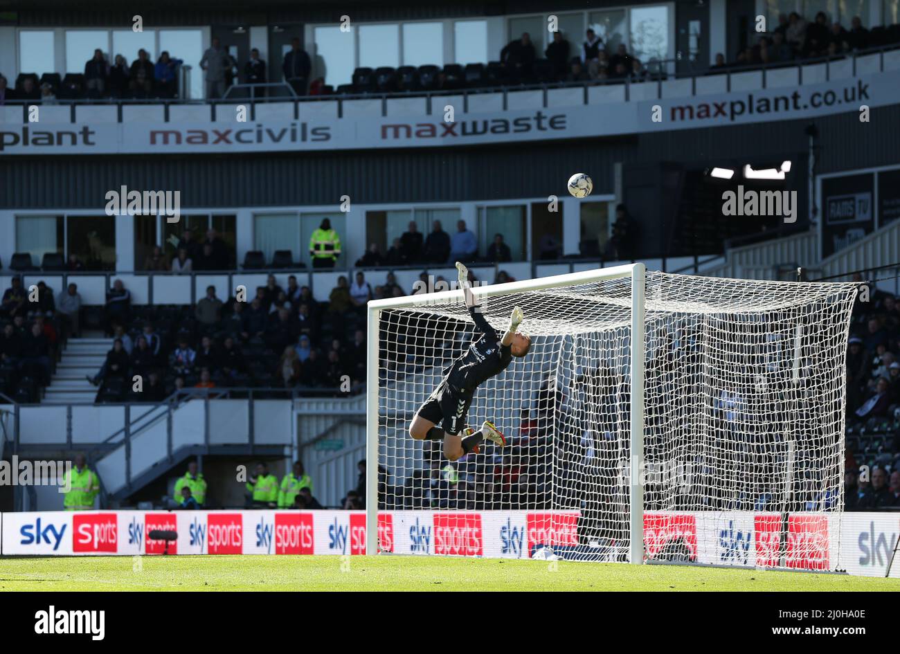 Coventry City goalkeeper Simon Moore makes a save during the Sky Bet ...