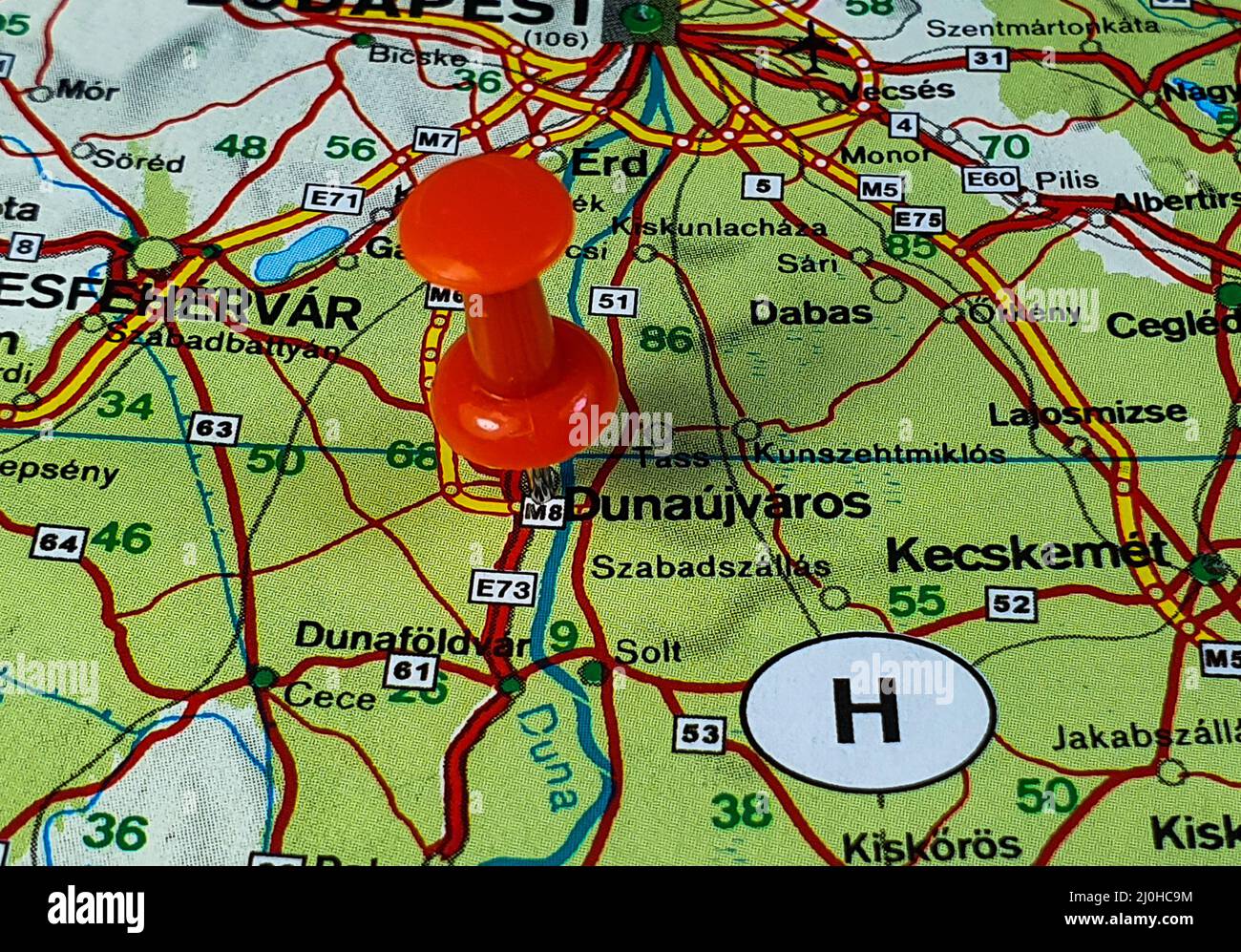 Closeup shot of a red mark on location on the map of Dunaujvaros city ...