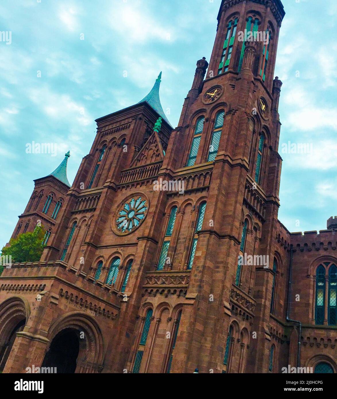 Brownstone church against the blue sky Stock Photo - Alamy