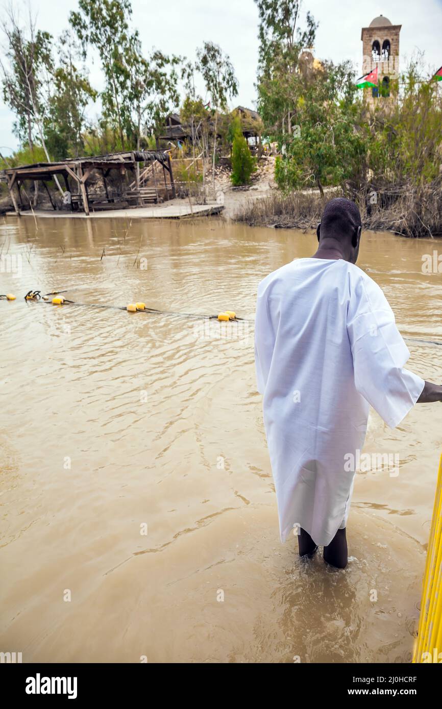 Baptismal ceremony hi-res stock photography and images - Alamy