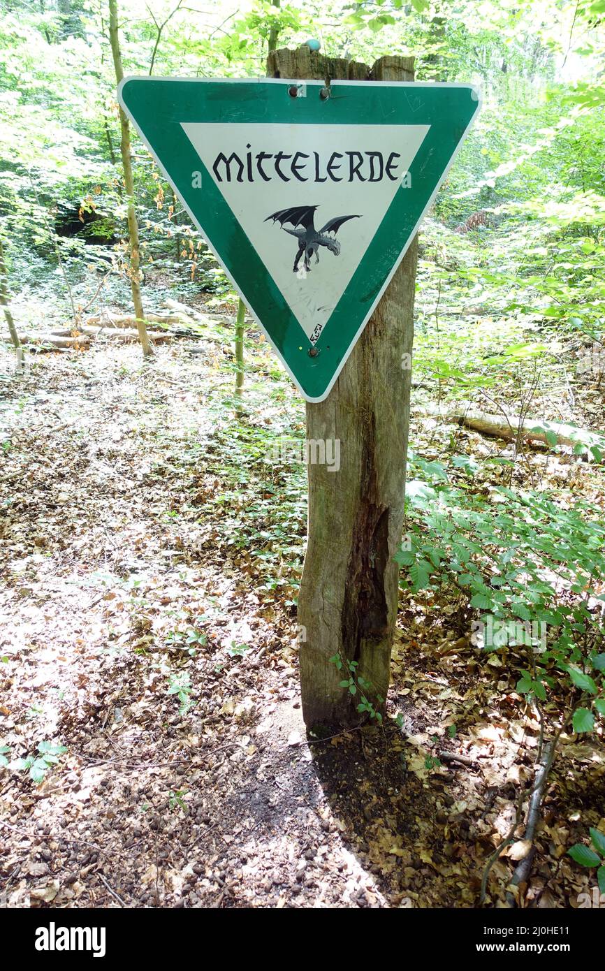 Middle Earth sign in the Kottenforst-Ville nature park, a former open ...