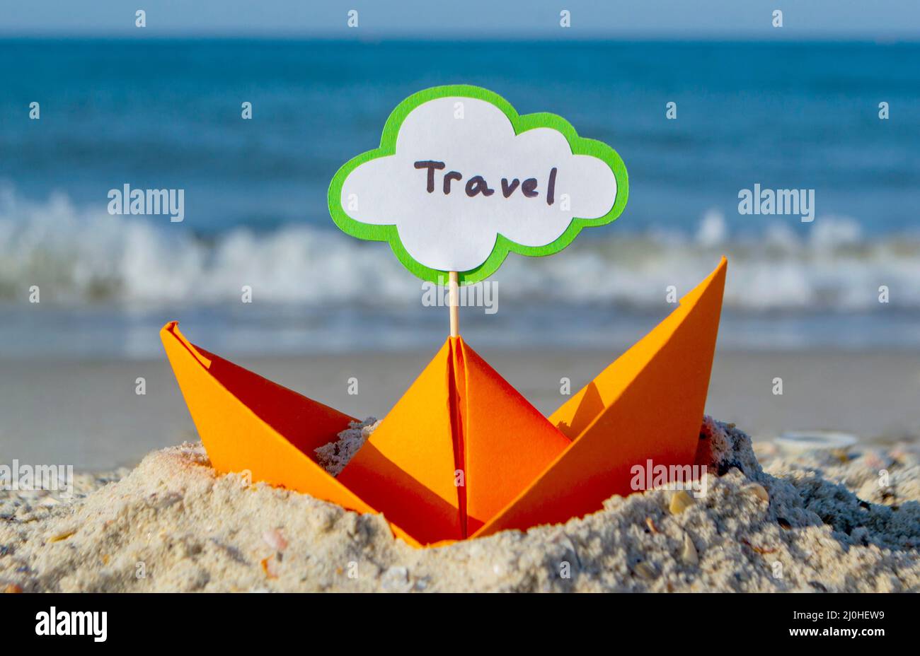Orange Paper Boat on Sandy Seashore Close-up. Small Boat from Paper ...