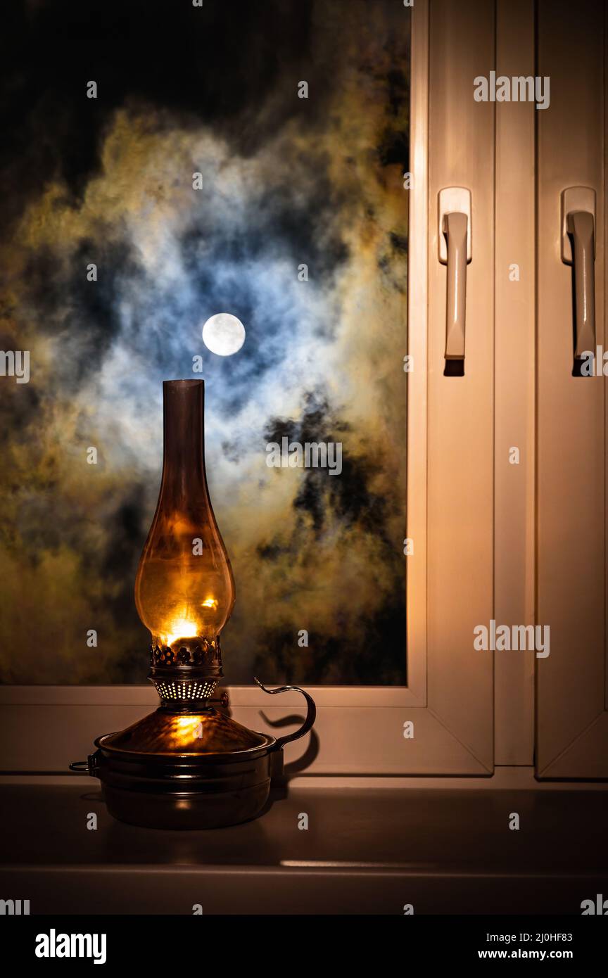 Night landscape outside the window moon old lamp windowsill Stock Photo ...