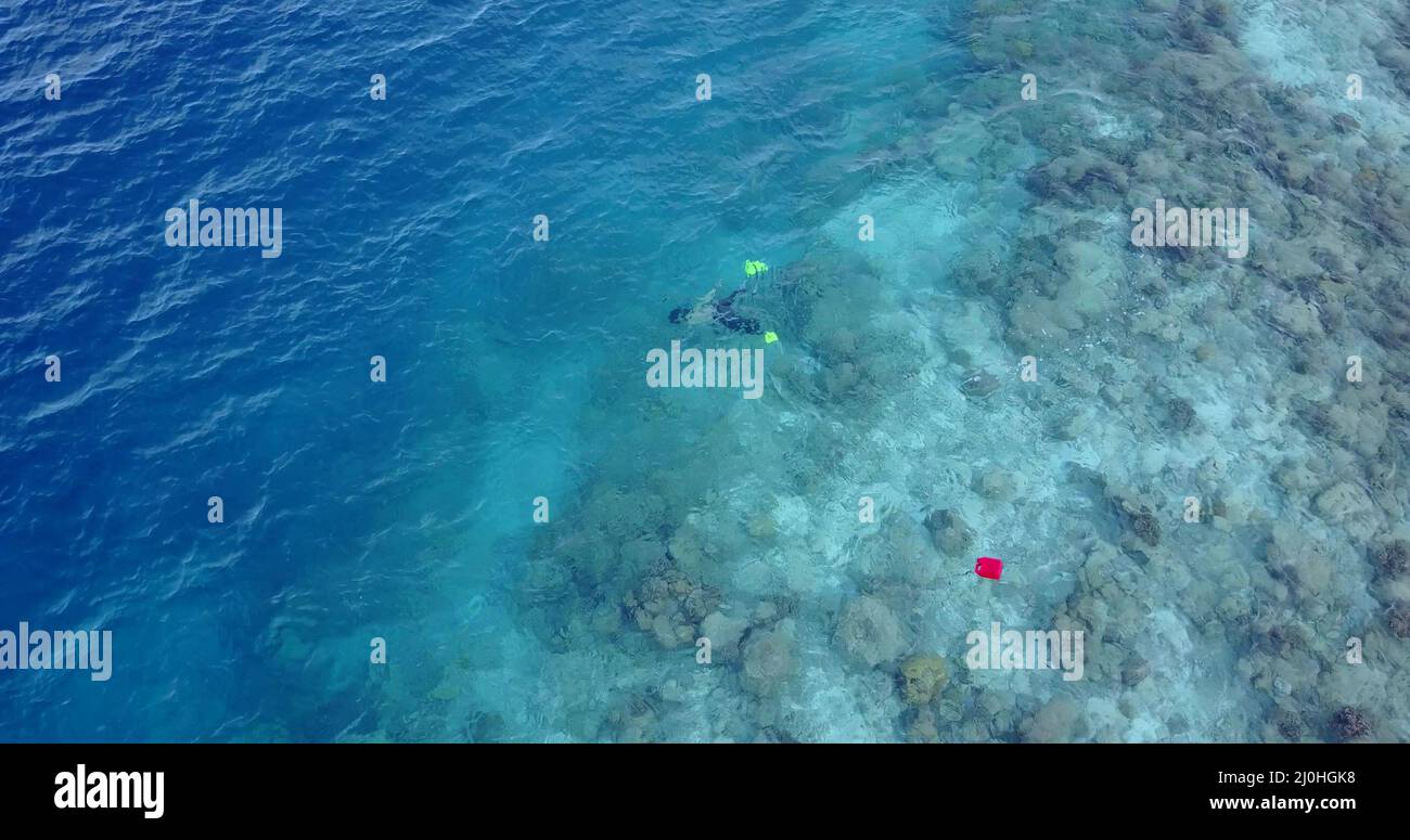 Bird's eye view of a diver in the azure water Stock Photo - Alamy