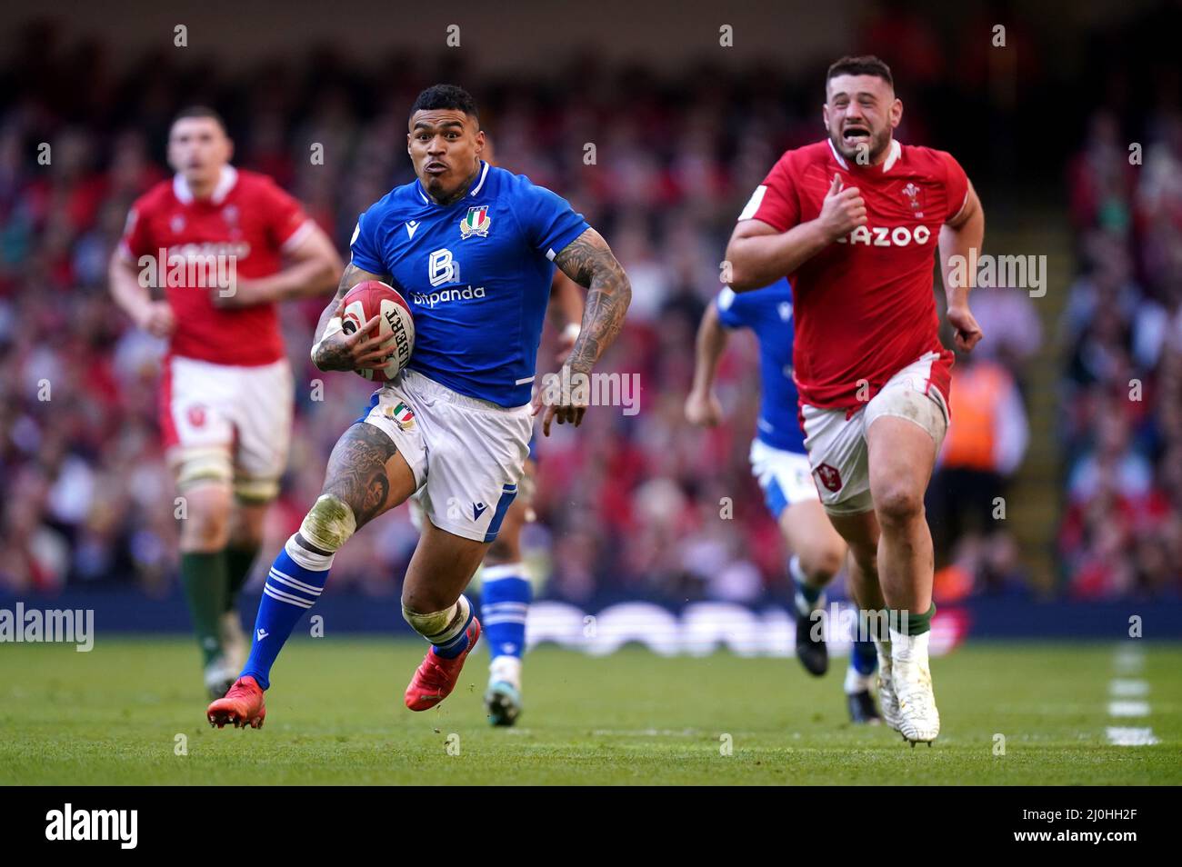 Italy's Monty Ioane breaks away during the Guinness Six Nations match ...
