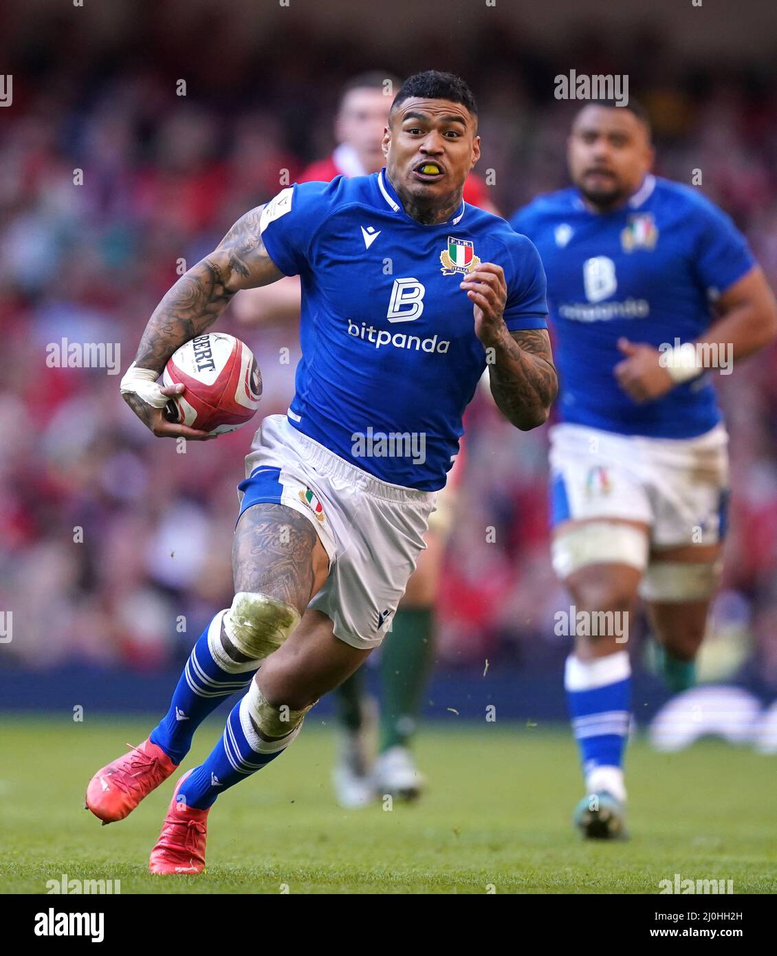 Italy's Monty Ioane breaks away during the Guinness Six Nations match ...