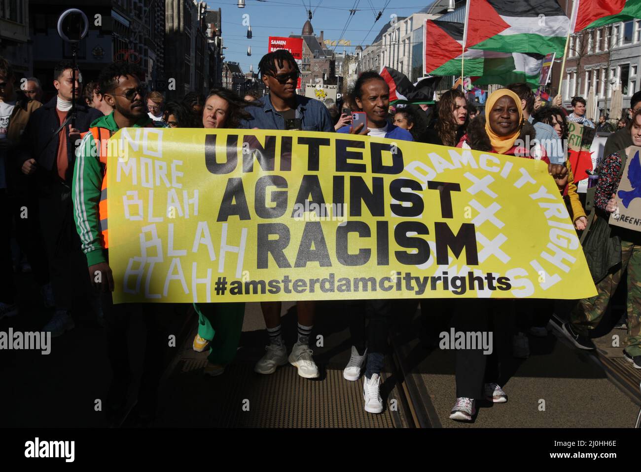 Amsterdam, Netherlands. 19th Mar, 2022. Activists and supporters take ...