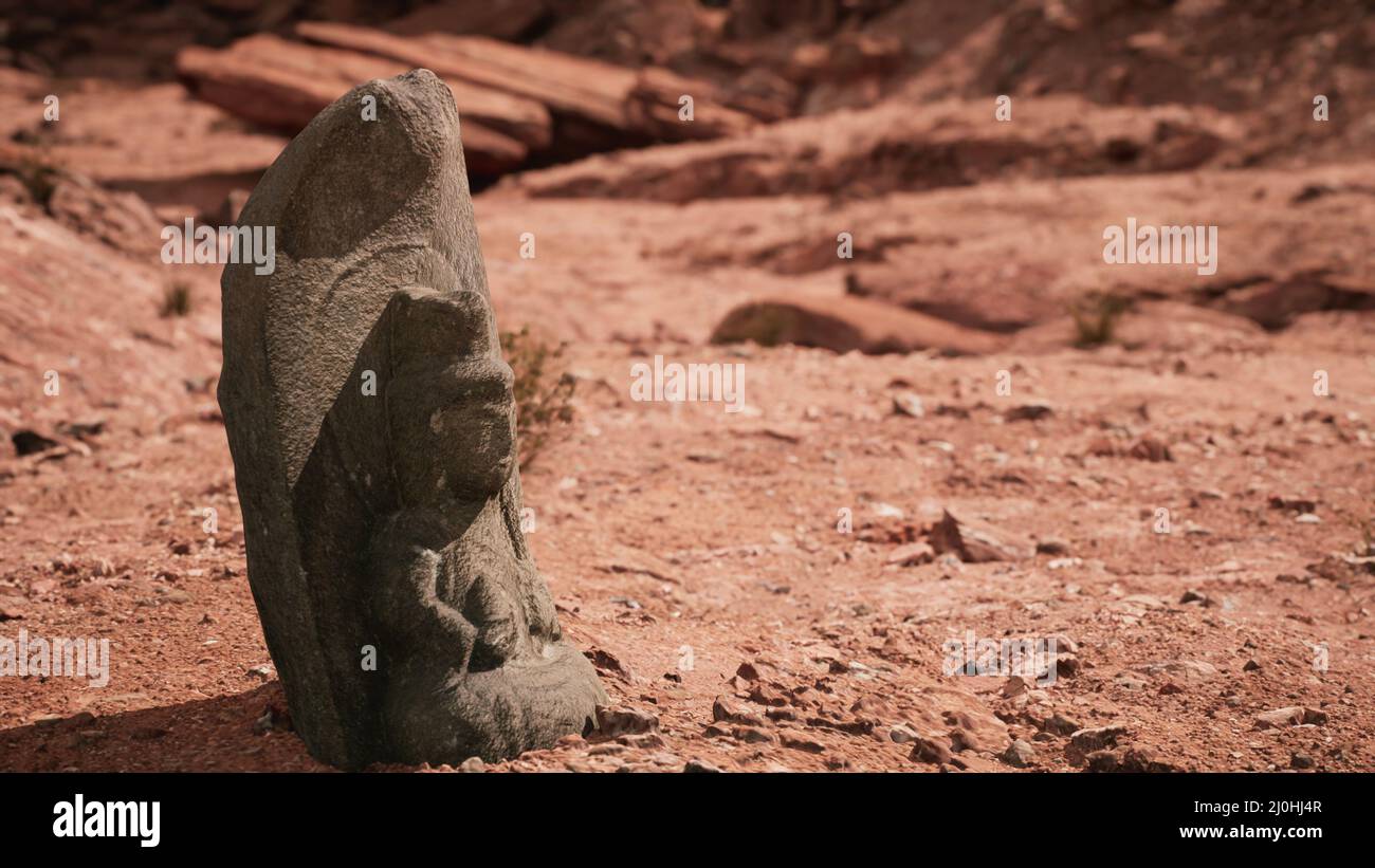 Ancient Statue on the Rocks Desert Stock Photo - Alamy