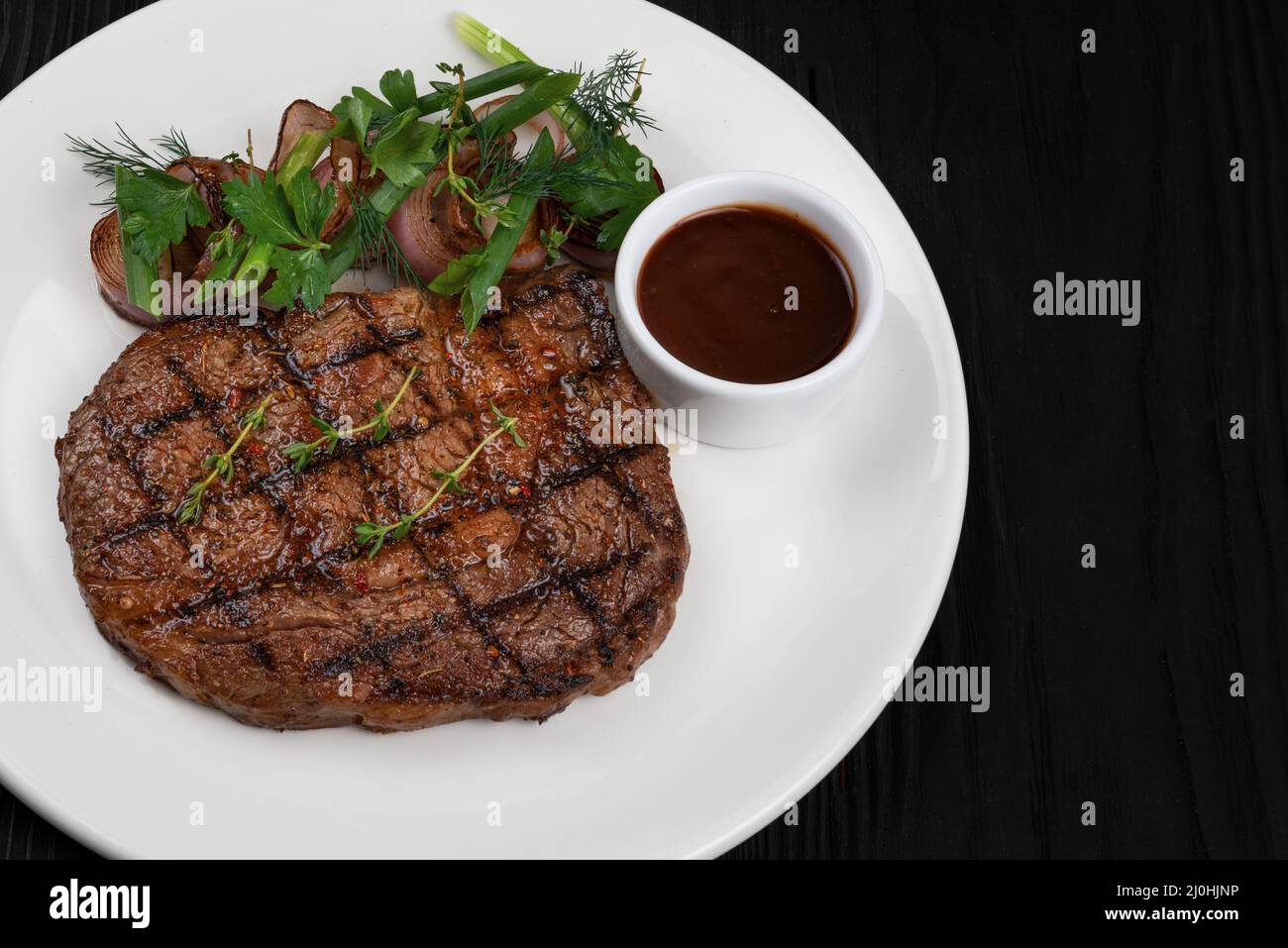 Grilled black angus steak Stock Photo - Alamy