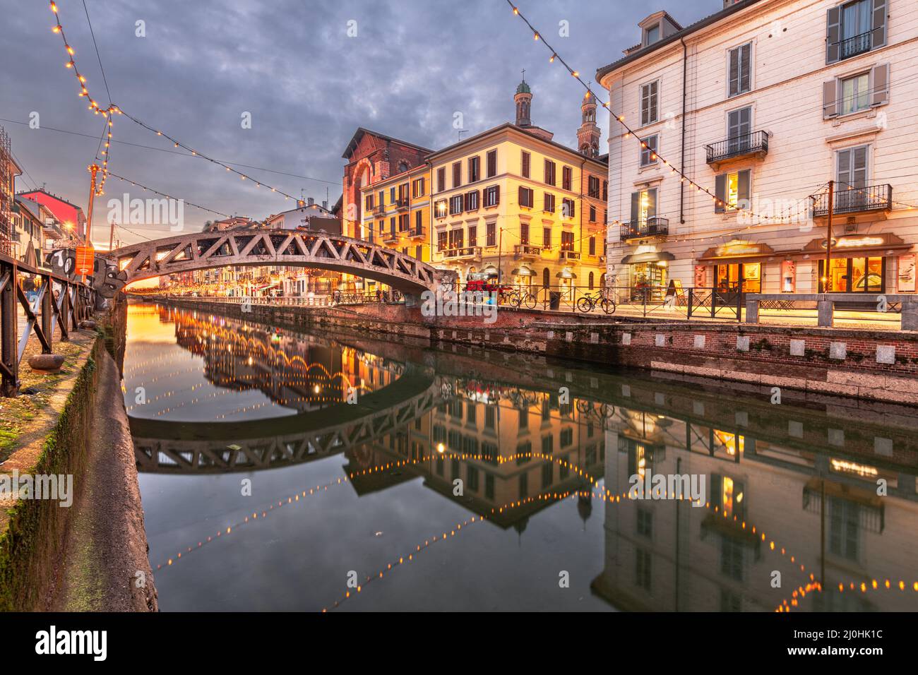 Naviglio Canal in Milan, Italy at twilight Stock Photo - Alamy