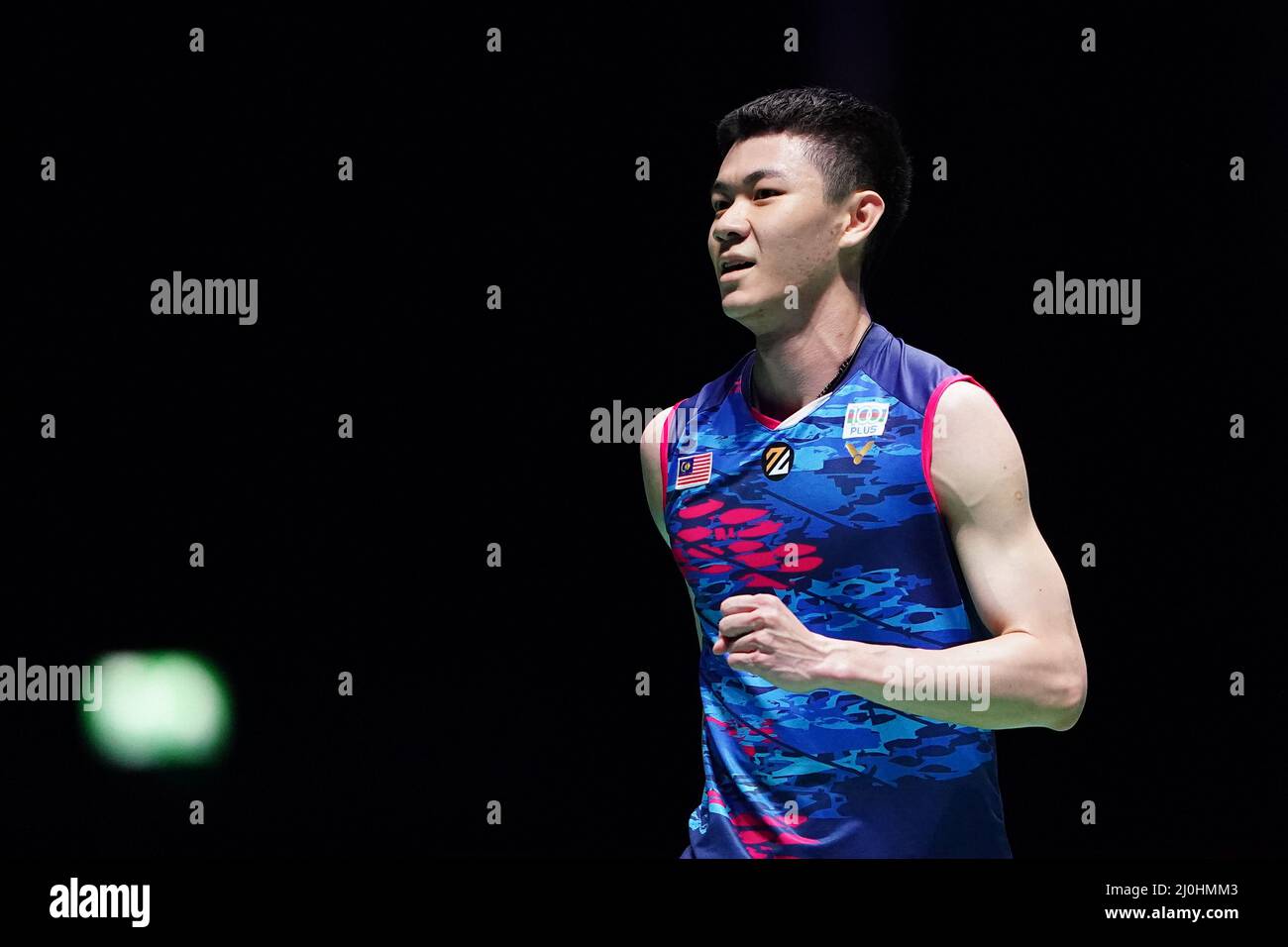 Malaysia's Lee Zii Jia in action against India's Lakshya Sen during day ...