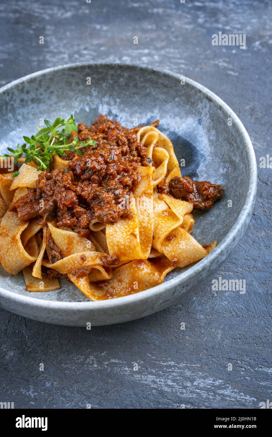 Modern Style Traditional Italian Ragu Alla Bolognese Sauce With Papedelle Pasta Noodles And