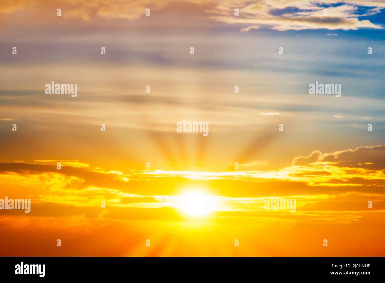 Sunset sky with sun rays Stock Photo - Alamy