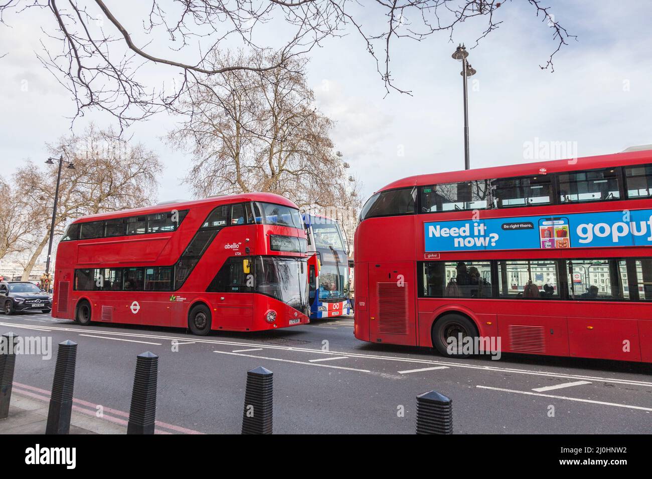 Red buses in Victoria Embankment, London,England,UK Stock Photo - Alamy