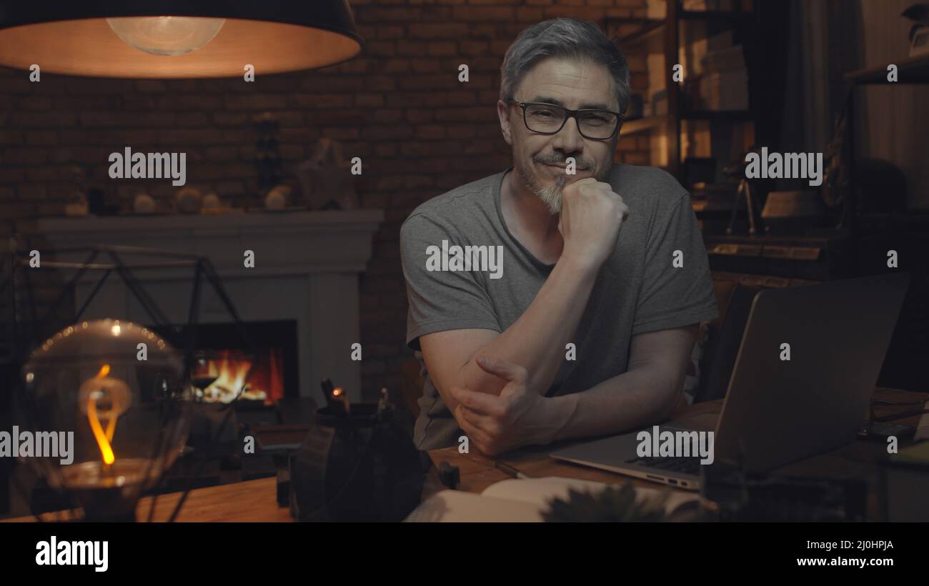 Older man in front of computer alone hi-res stock photography and ...