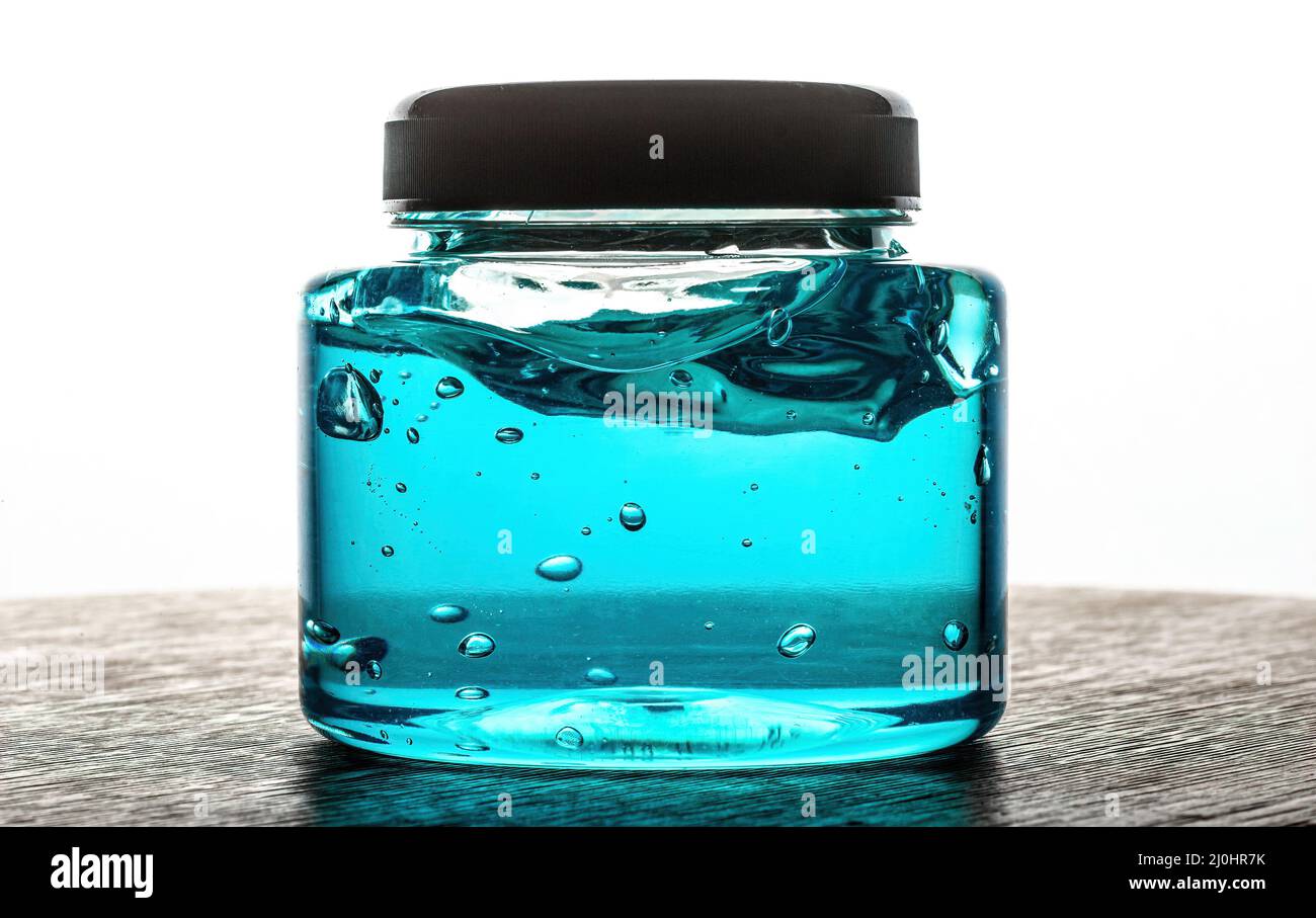 Transparent blue gel with bubbles in a tube. Blank cosmetic lotion ...