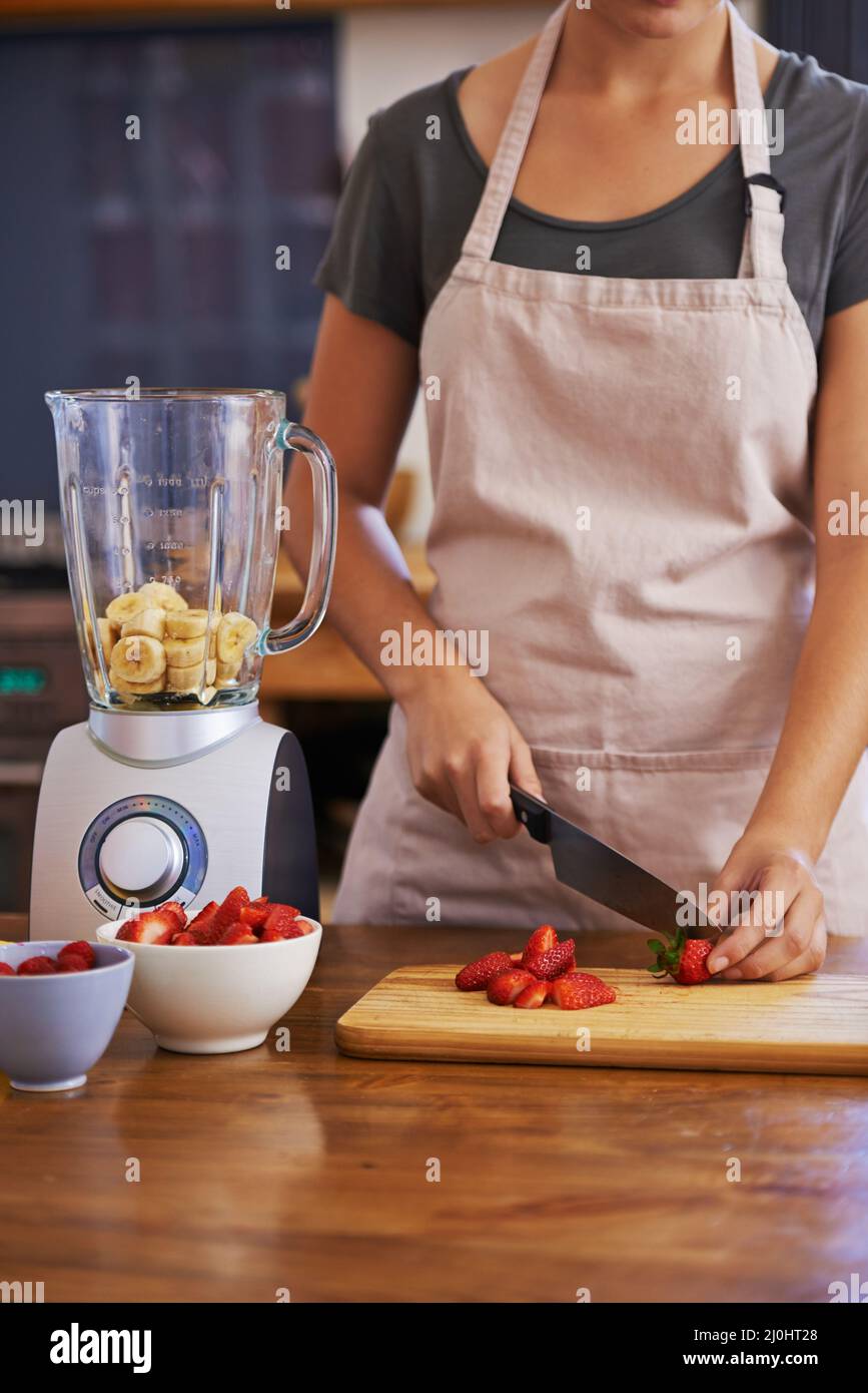 Woman chopping fruit hi-res stock photography and images - Alamy