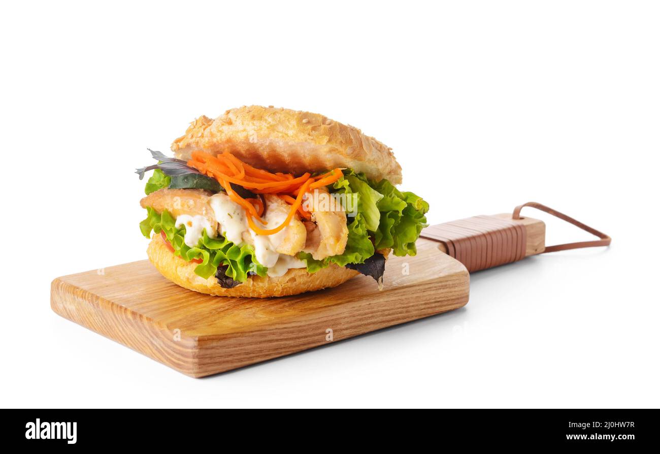 Board with fresh doner kebab in bun on white background Stock Photo - Alamy