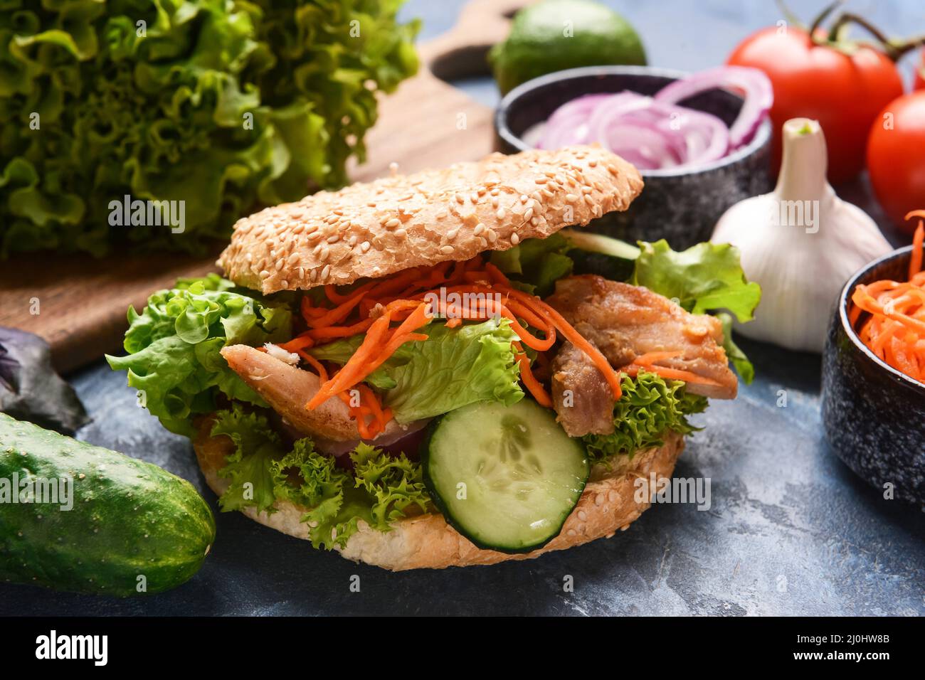 Fresh doner kebab in bun on color background Stock Photo - Alamy