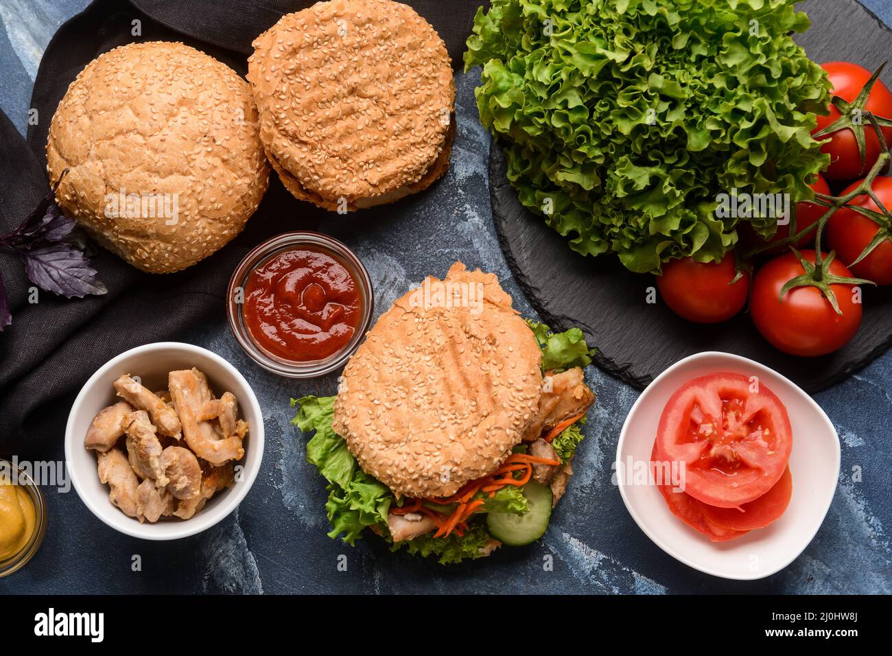 Fresh doner kebab in bun and ingredients on color background Stock ...